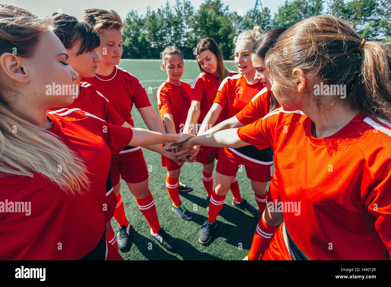 Stacking hands hi-res stock photography and images - Alamy