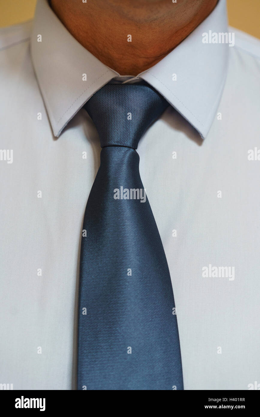 Confident businessman standing wall hi-res stock photography and images - Alamy