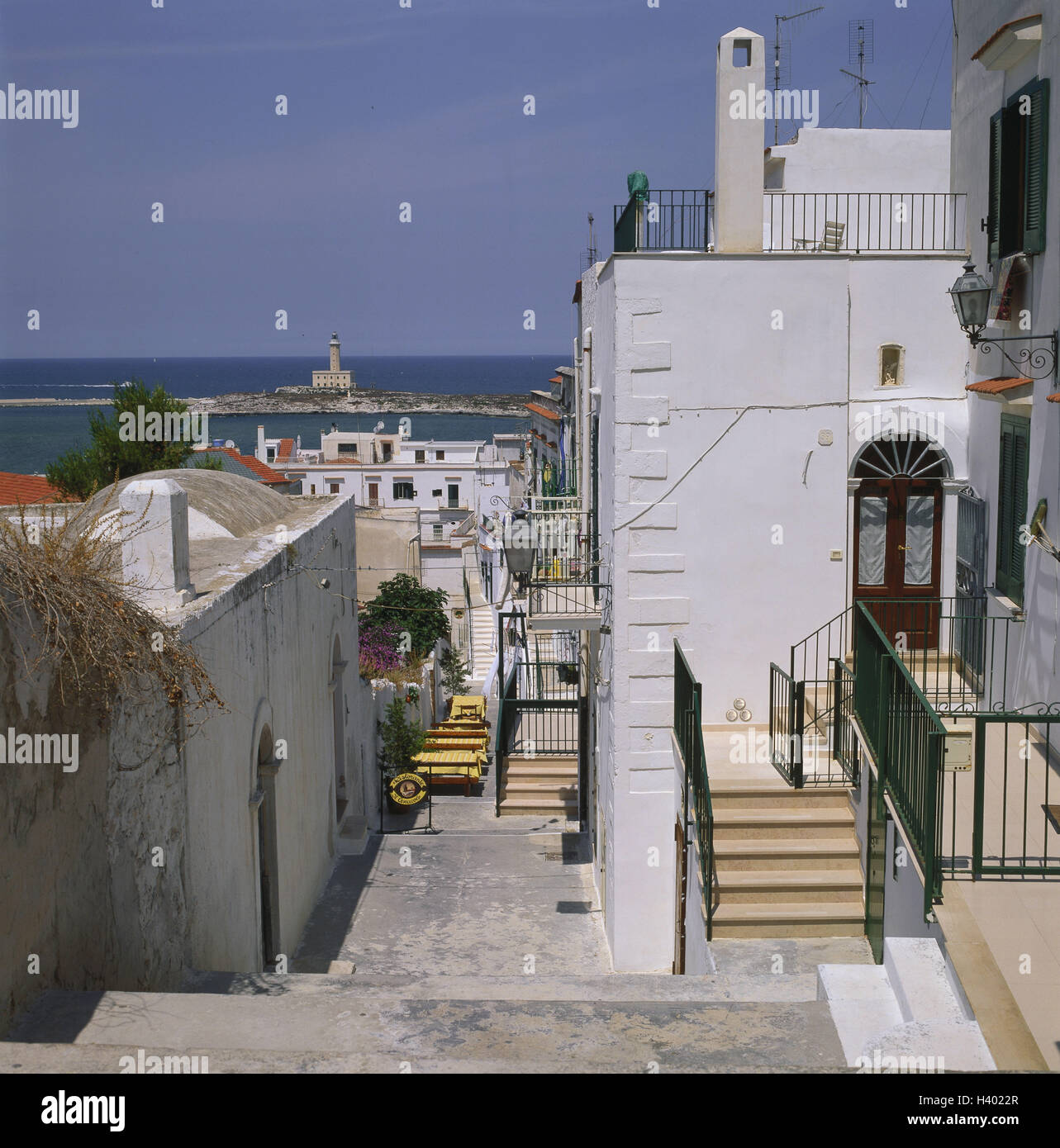 Italy, Apulia, Vieste, lane, street cafe, coast, sea, local view ...