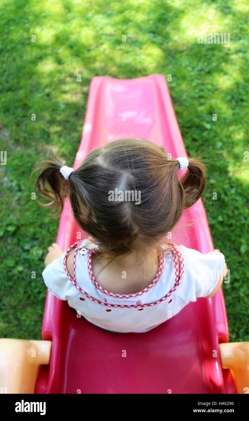 Girls on slide hi-res stock photography and images - Alamy