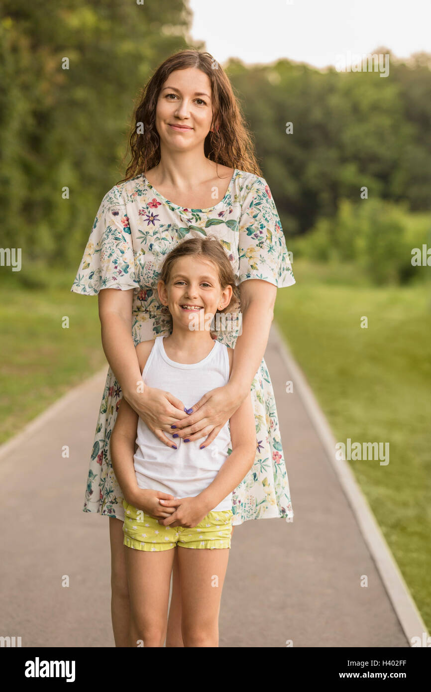 Daughter standing hi-res stock photography and images - Alamy