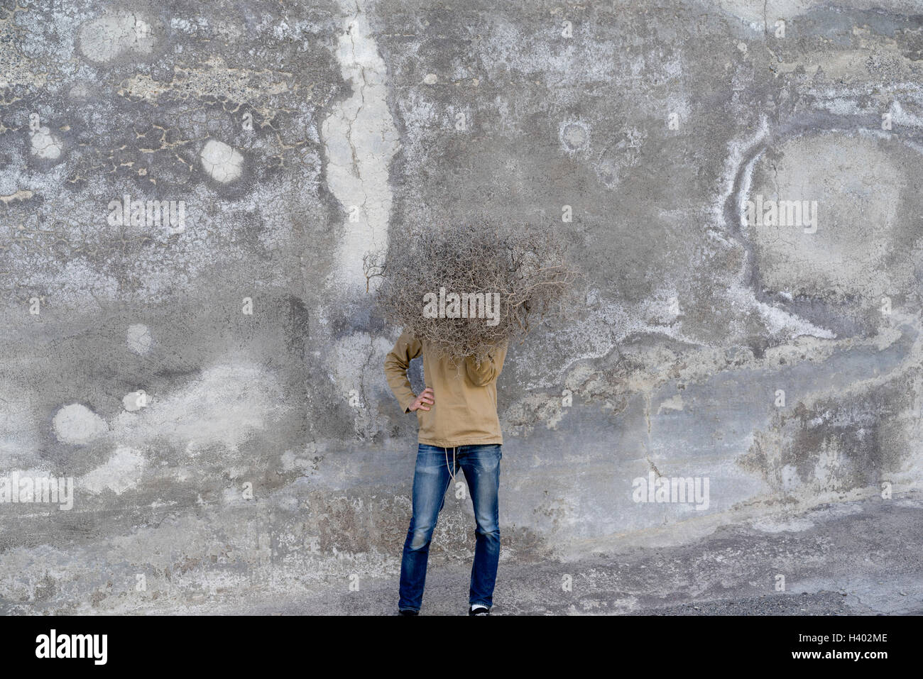 Man standing hands wall hi-res stock photography and images - Alamy