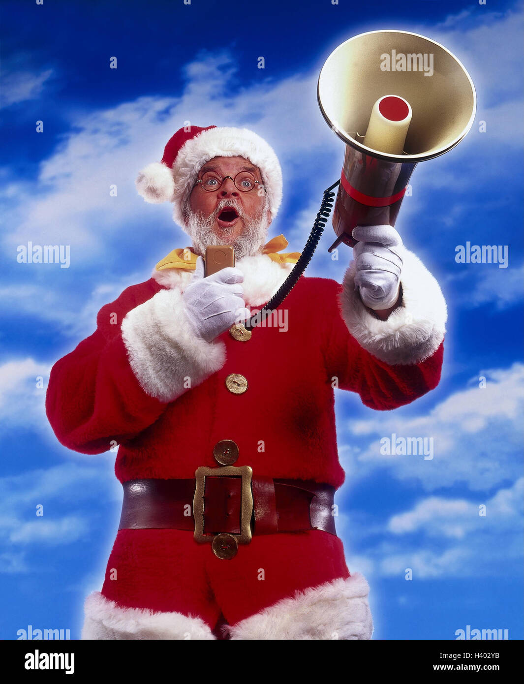 Santa Claus, megaphone, half portrait, Composing, cloudy sky, studio ...