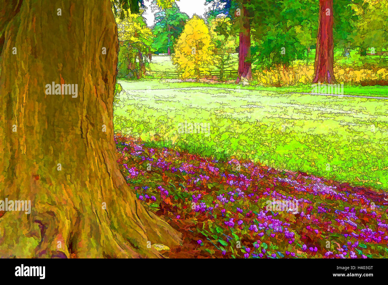 Pink flowers under a tree in a beautiful English park bright colours ...