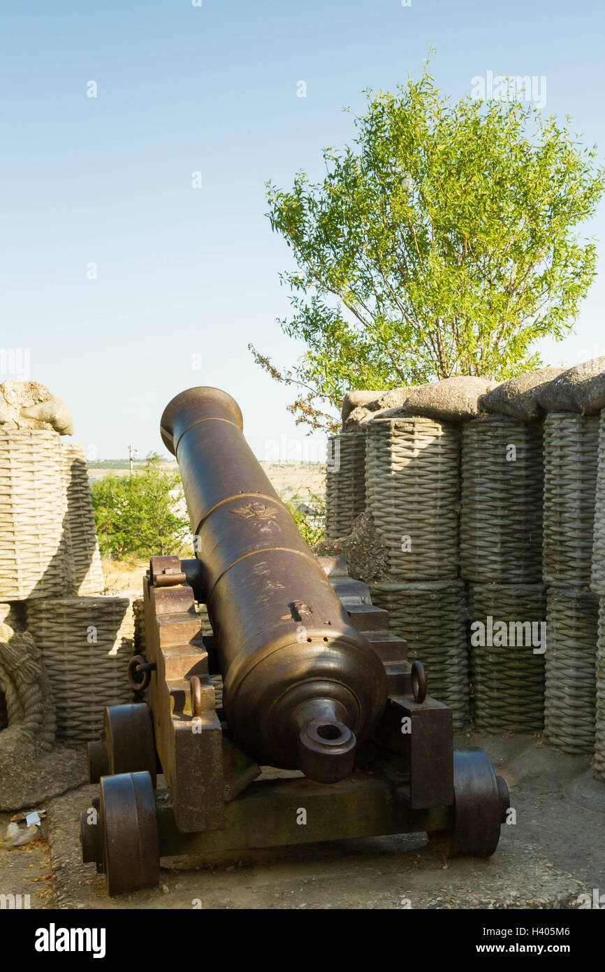 Gun weapons on the street in the summer Stock Photo - Alamy