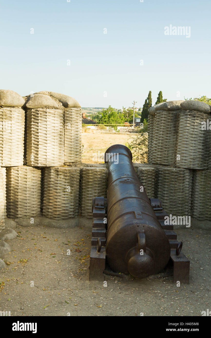 Gun weapons on the street in the summer Stock Photo - Alamy