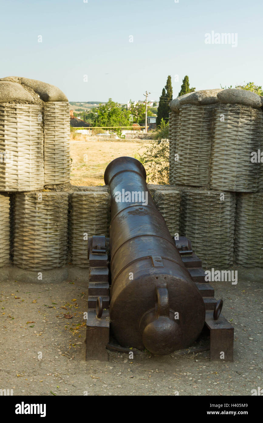 Gun weapons on the street in the summer Stock Photo - Alamy