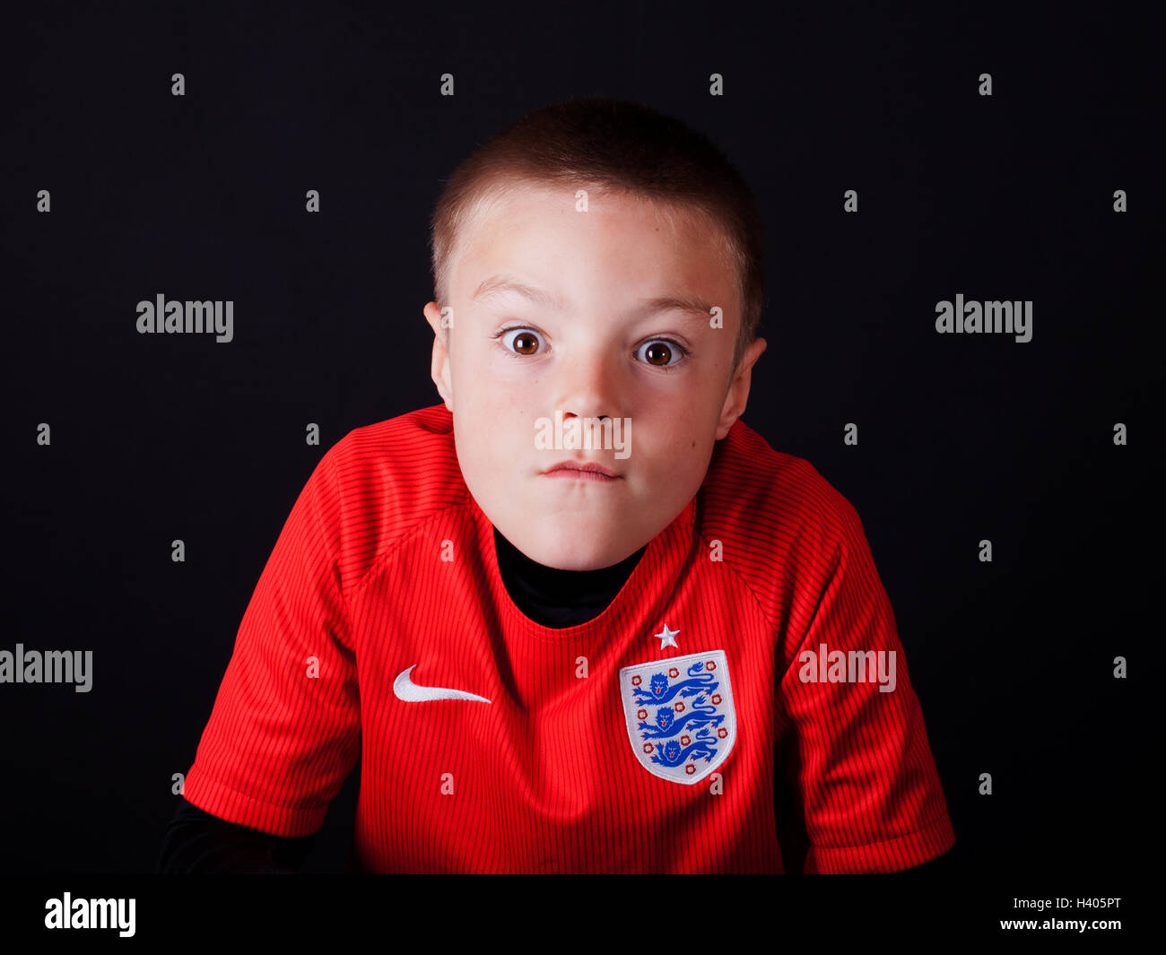 Young boy in England Football shirt Stock Photo - Alamy