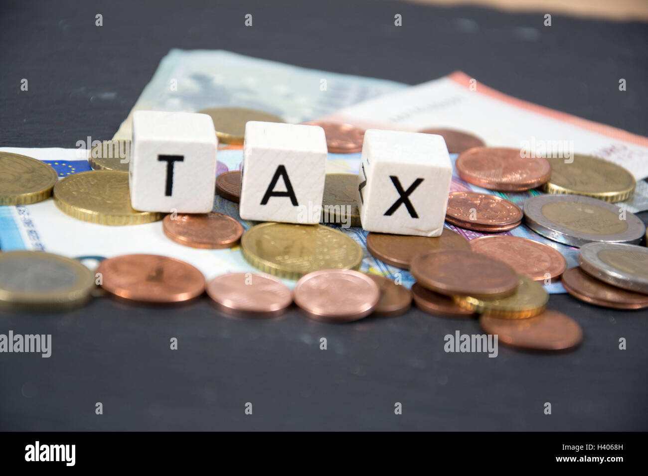 symbol image for tax Stock Photo - Alamy