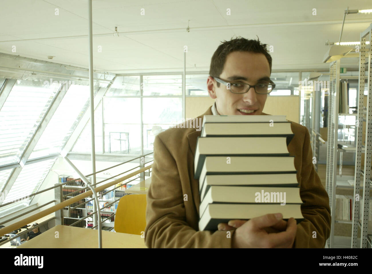 Library, man, book batch, half portrait, library, public library ...