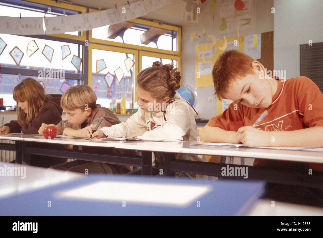 Classrooms, school desks, schoolgirls, schoolboys, writing work school ...