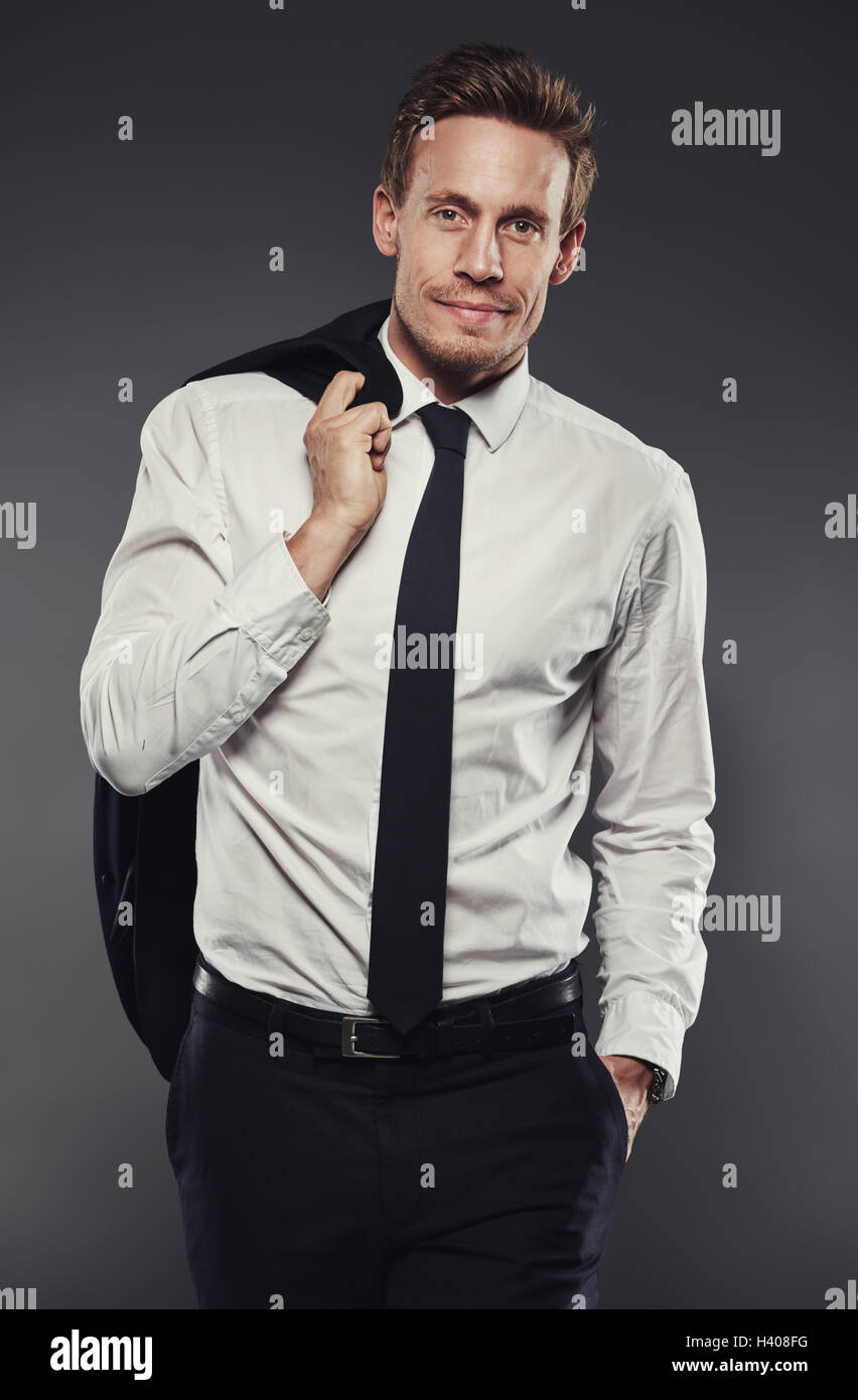 Man carrying jacket over shoulder hi-res stock photography and images ...