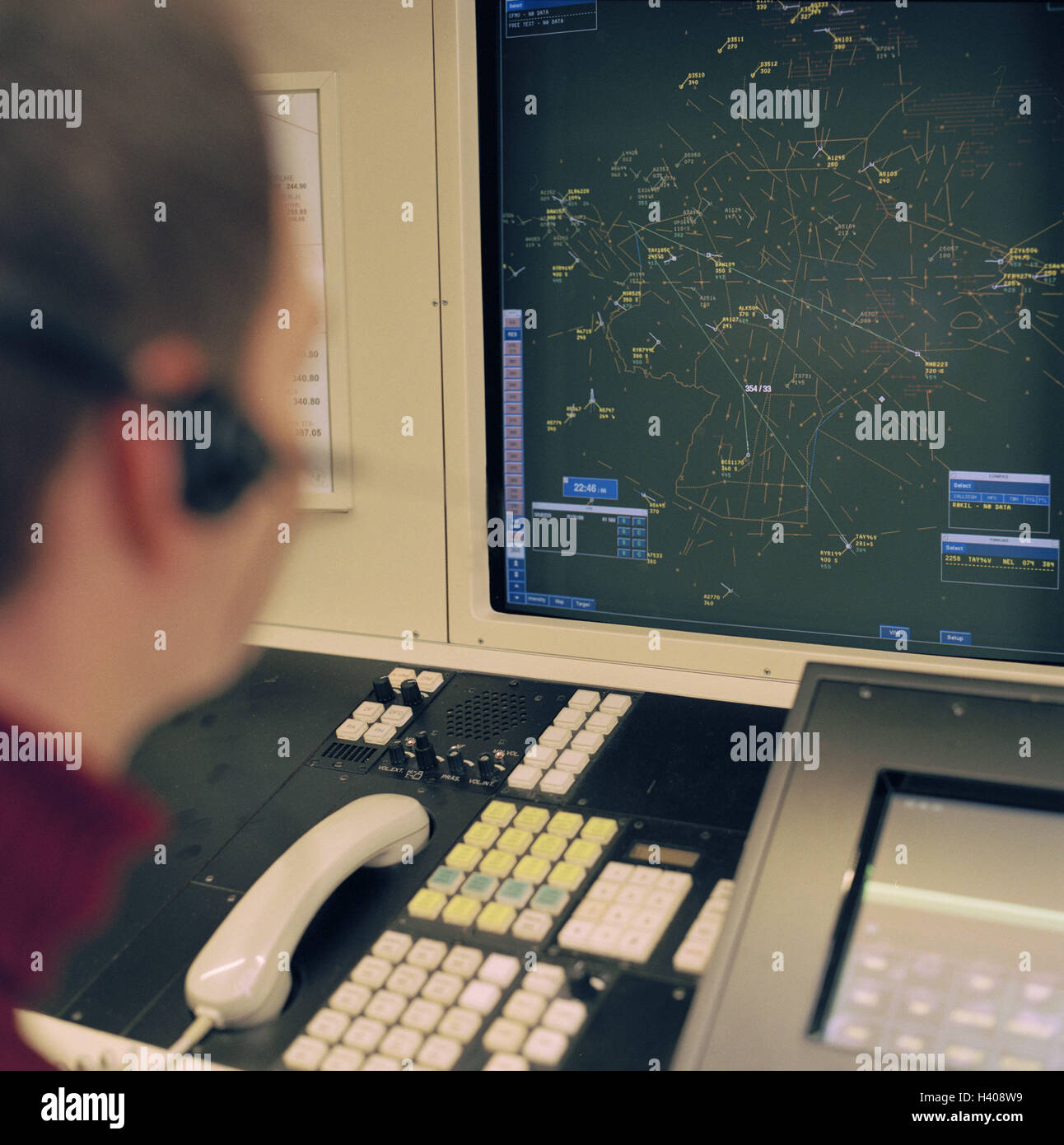 Airport, controlling tower, air traffic controller, headset, display ...