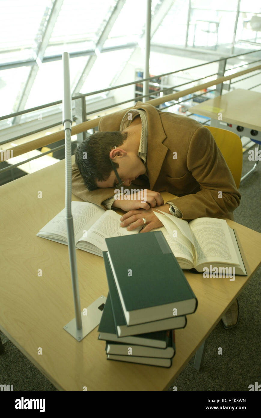 Library, man, book batch, sleep library, public library, student, table ...