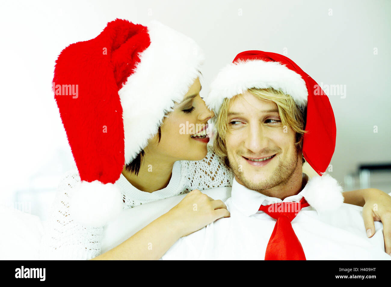 Sofa, couple, happy, Santa's hats, tenderness, whisper, portrait ...