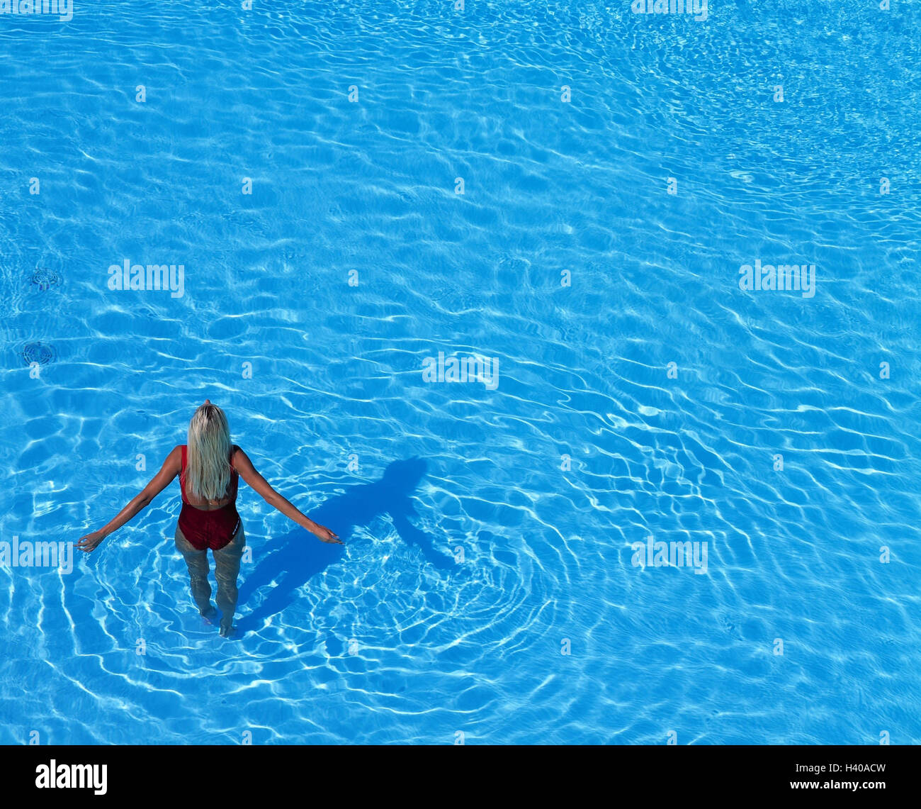 Swimming pool, water, woman, stand, back view, outside, pool, young ...