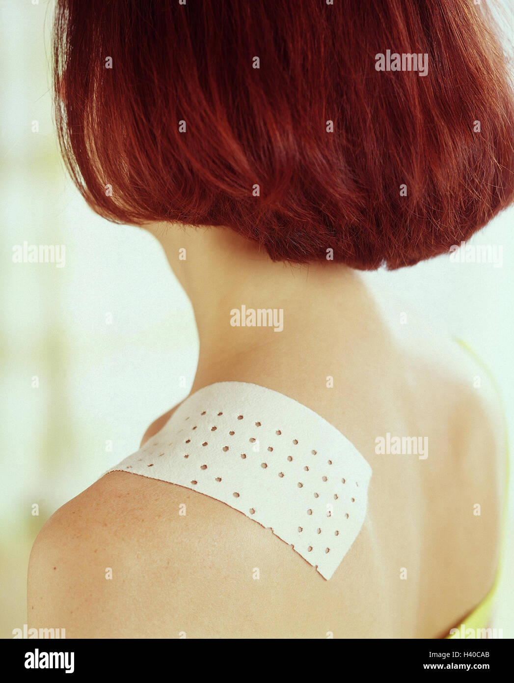 Woman, young, shoulder range, caloric plaster, pain treatment ...