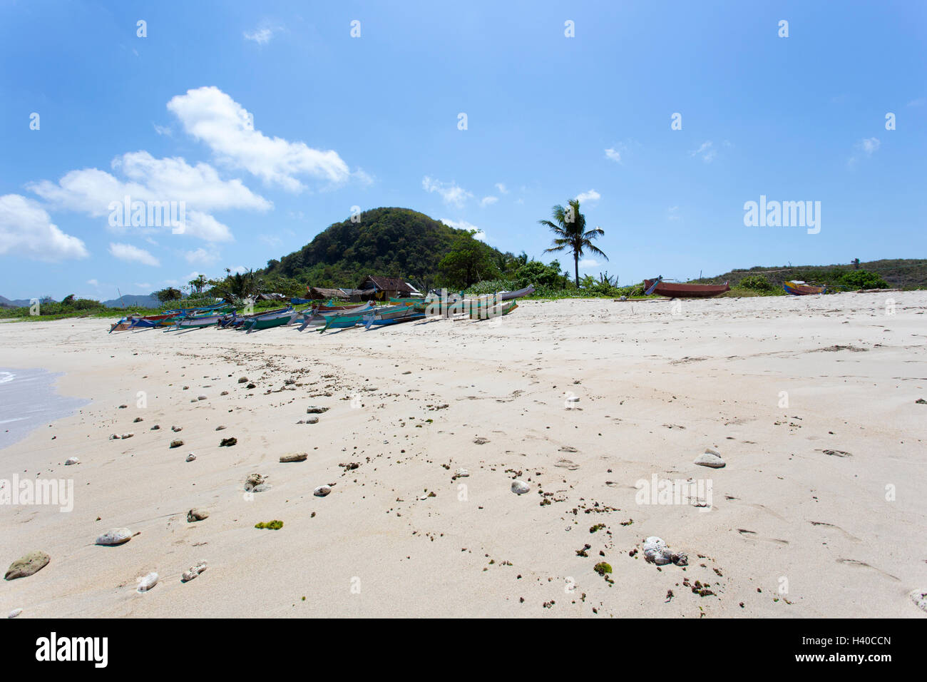 sand beach with boats in Lombok, Indonesia Stock Photo - Alamy