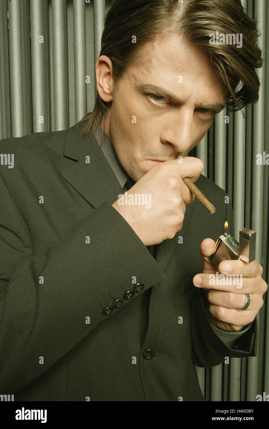 Man black suit cigar hi-res stock photography and images - Alamy