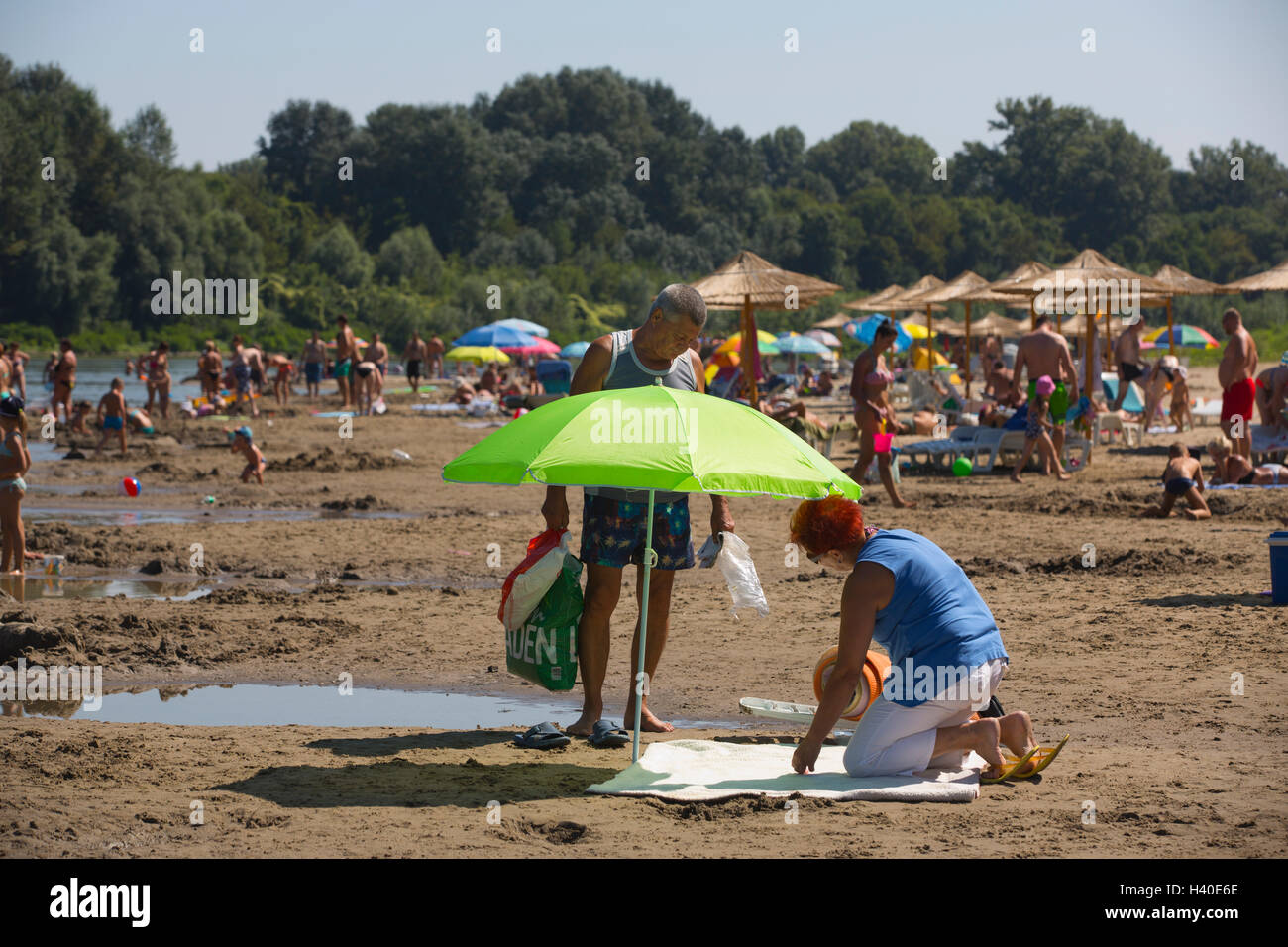 Hungarians enjoying the summer temperatures at Koros Torok sandy beach ...