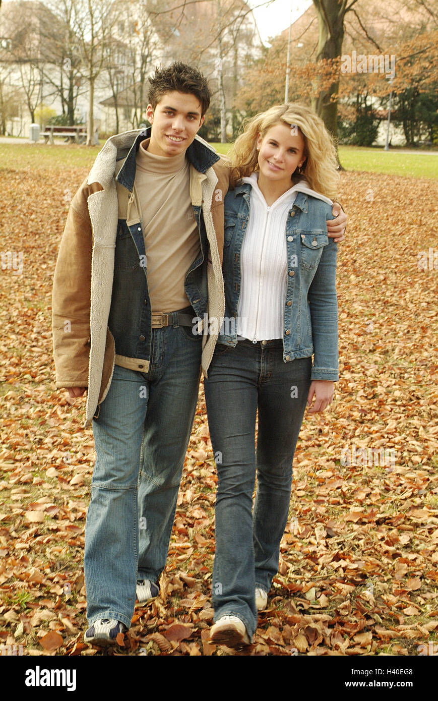Teenager's couple, happy, walk, park, autumn, leisure time, teenagers ...