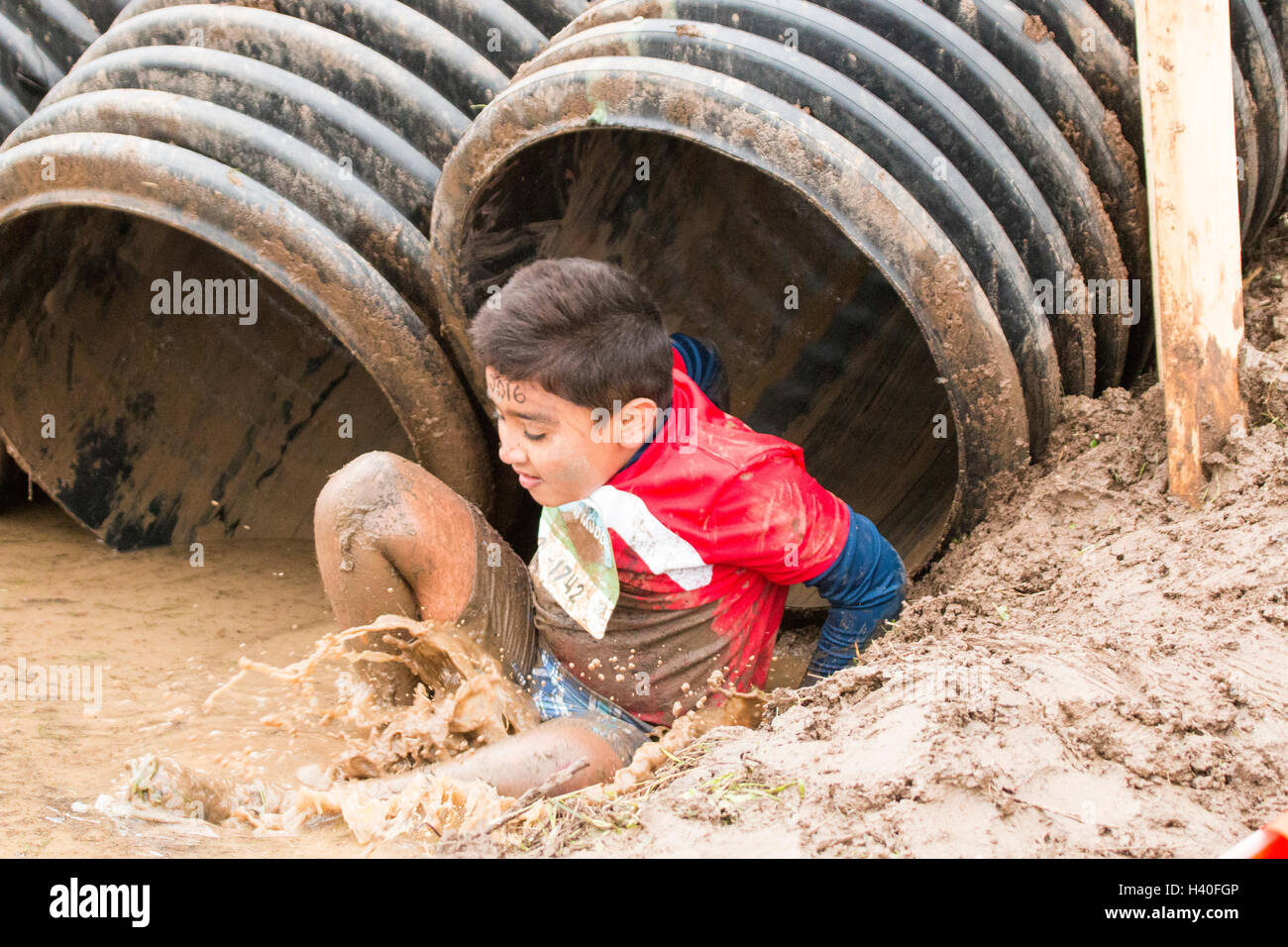 Tough Mudder fruit shoot mini mudder race for children Stock Photo - Alamy