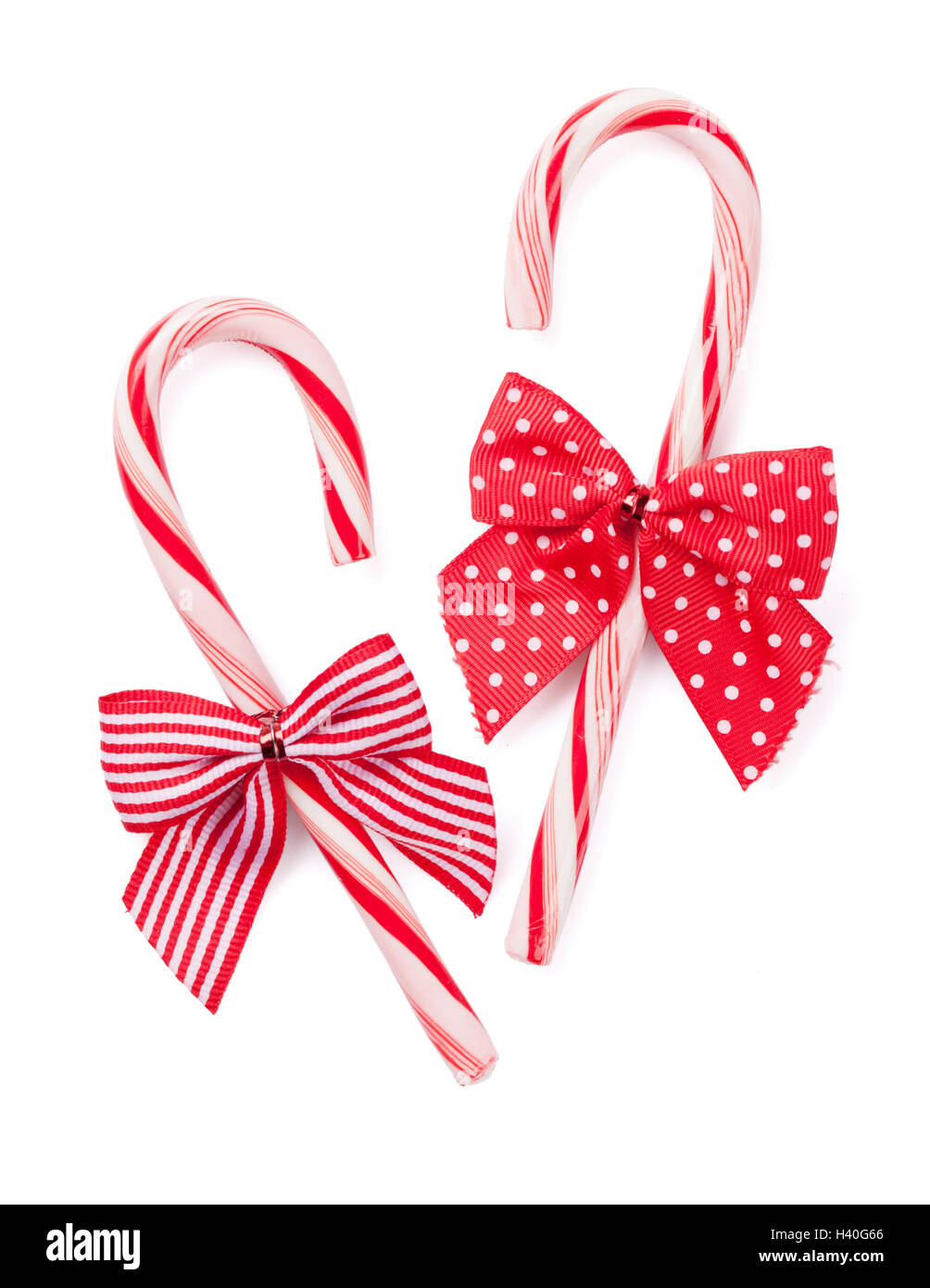 Candy cane with bow. Isolated on white background Stock Photo - Alamy