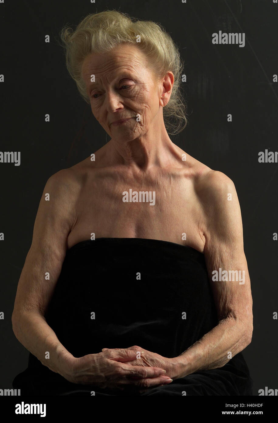 Senior, view lowered, hands folded, half portrait, model released, very ...