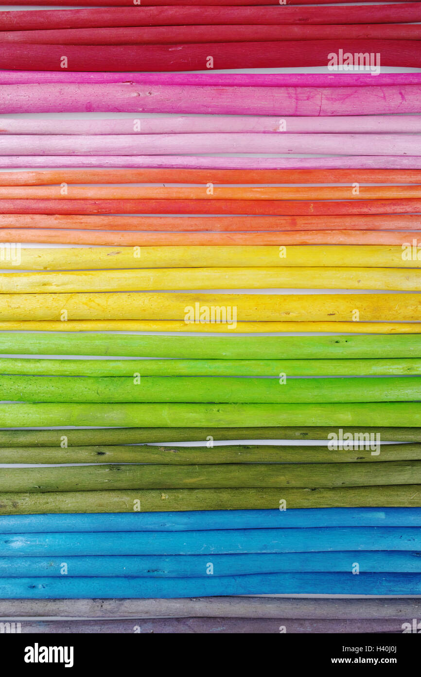 Decorative colorful wooden sticks on white background Stock Photo - Alamy