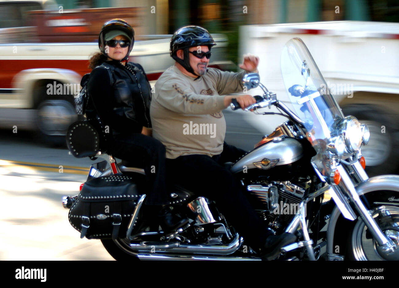 Couple, middle old person, motorcycle drive, side view, blur, no model ...