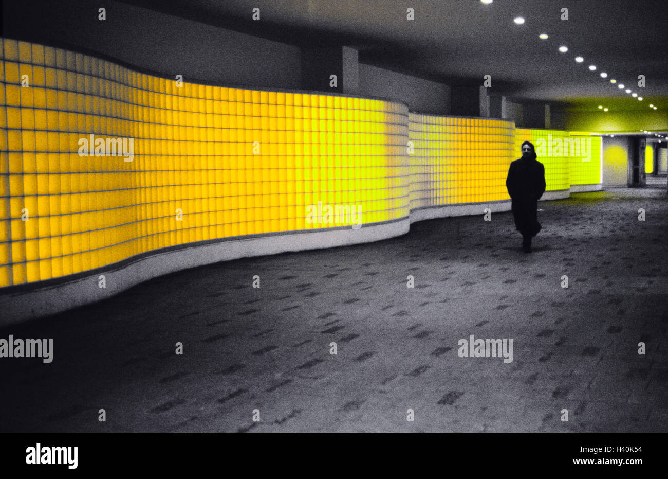 Passage, glass blocks, lighting, yellow, passer-by, no model release ...