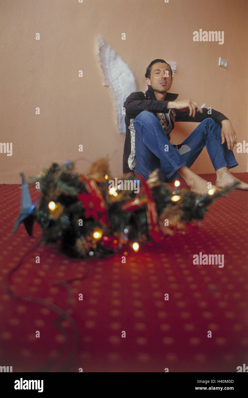 Floor, Christmas tree, lie, smoke man, angel's wing, cigarette ...