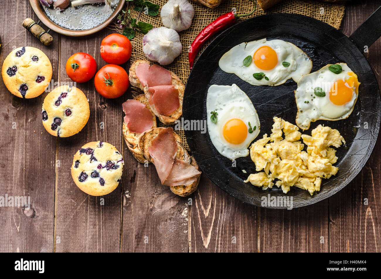 Full protein breakfast - garlic toast with eggs and muffins, cherry ...