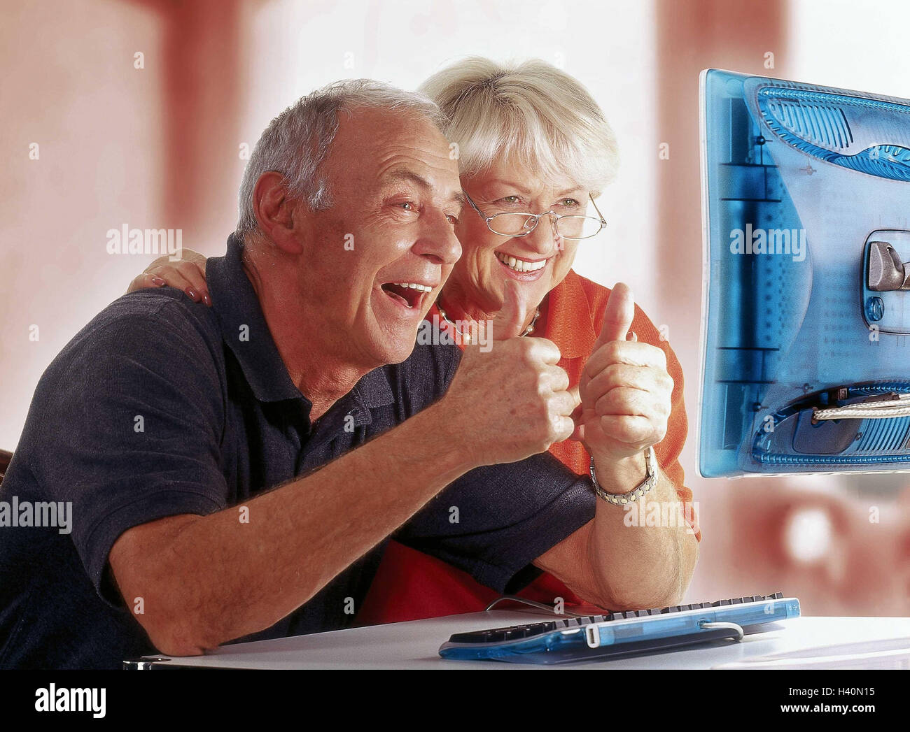 Senior couple, desk, computer, detail, keyboard, flat screen, laugh ...