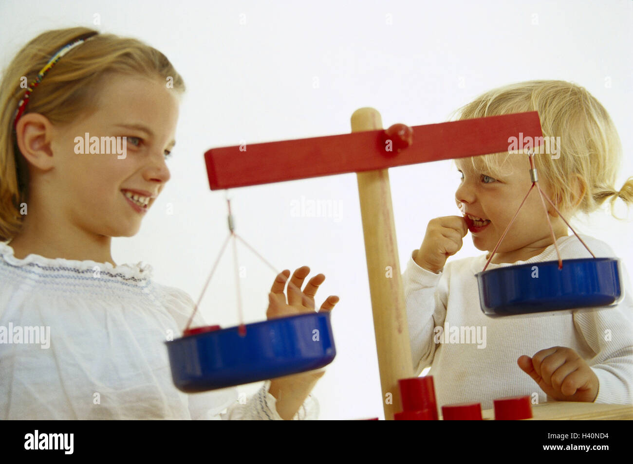Distribute toys scales hi-res stock photography and images - Alamy