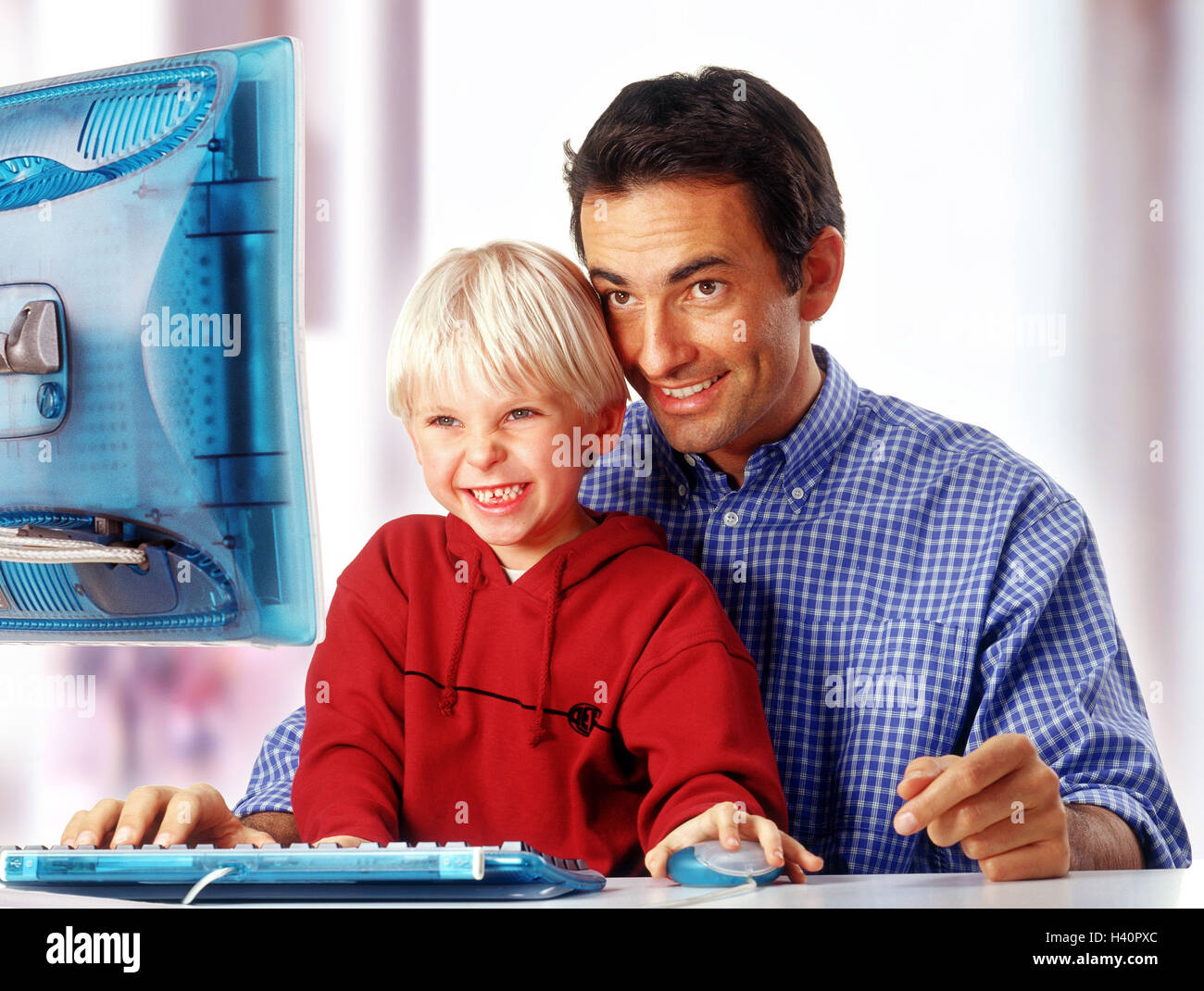 Father, son, computer, laugh Families, man, child, game, computer game ...