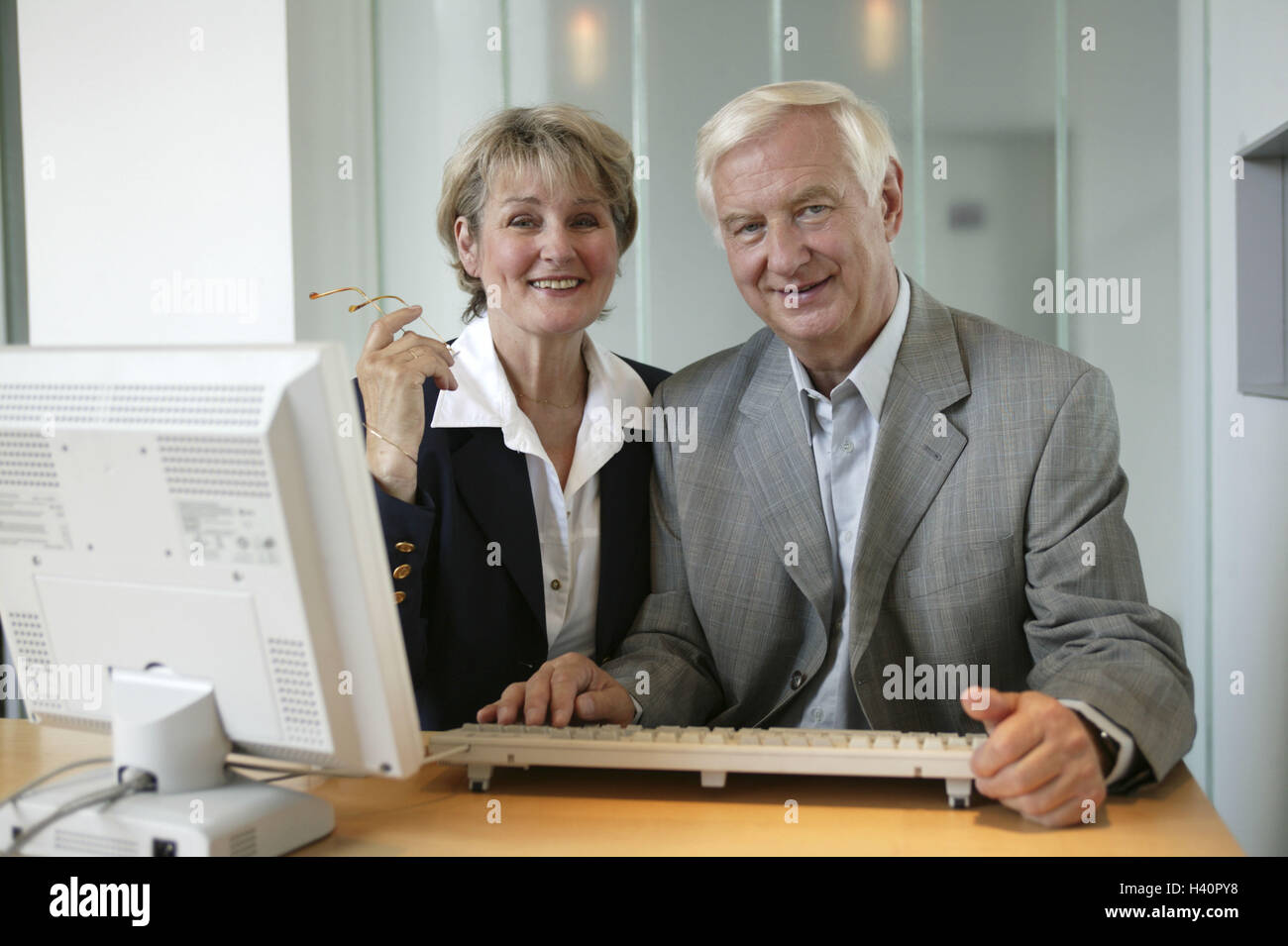 Office, workplace, Senior couple, smile, computer, half portrait ...
