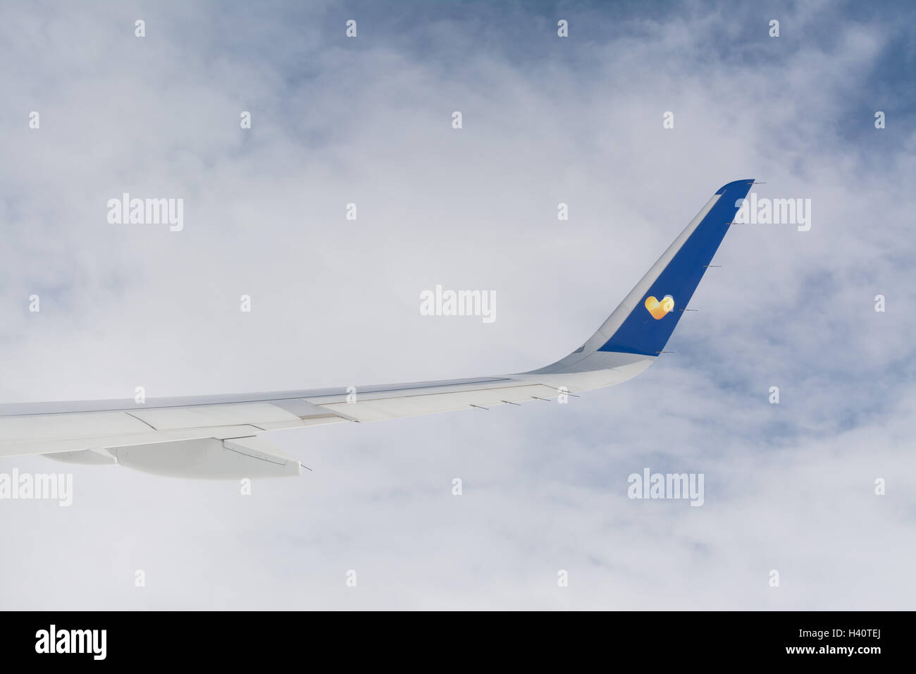 Thomas Cook plane wing with heart logo Stock Photo - Alamy