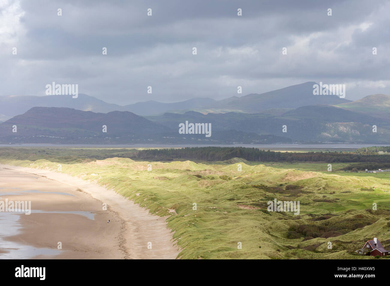Storm clouds over Harlech beach and the Snowdonia mountain range ...