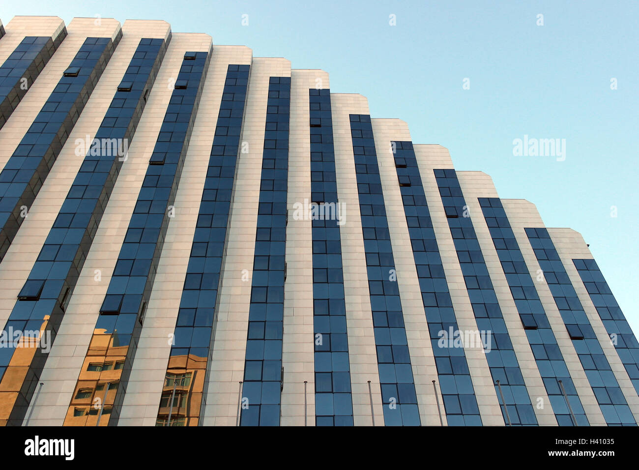 Modern mirrored building Stock Photo - Alamy