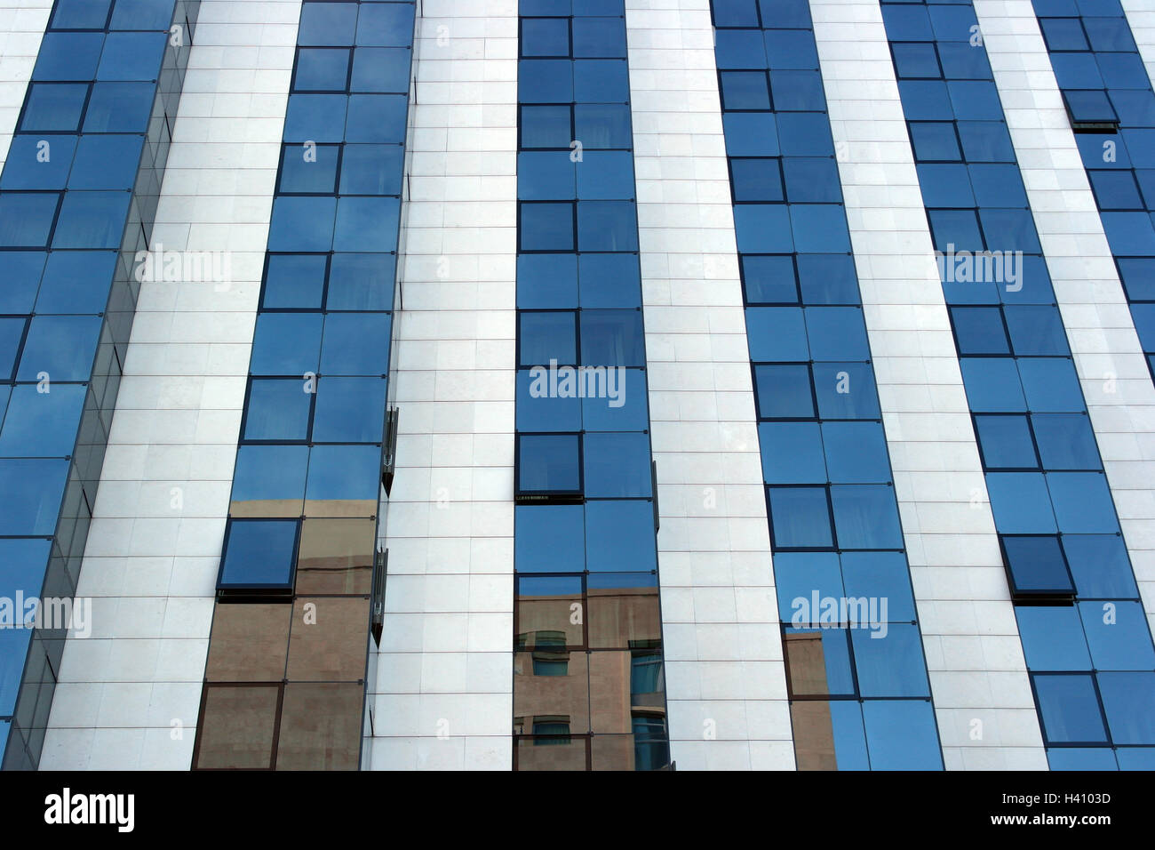 Modern mirrored building Stock Photo - Alamy