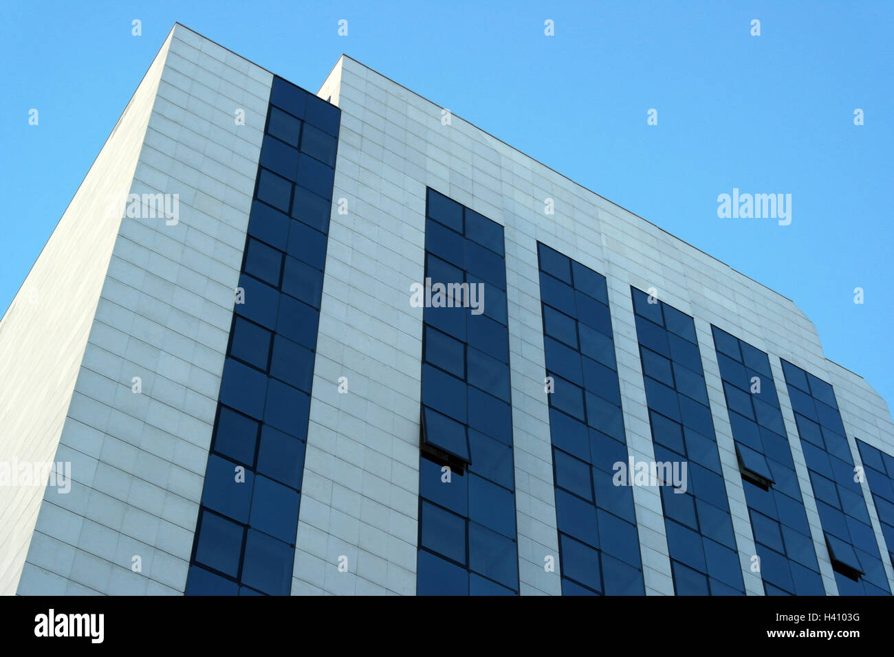 Modern mirrored building Stock Photo - Alamy