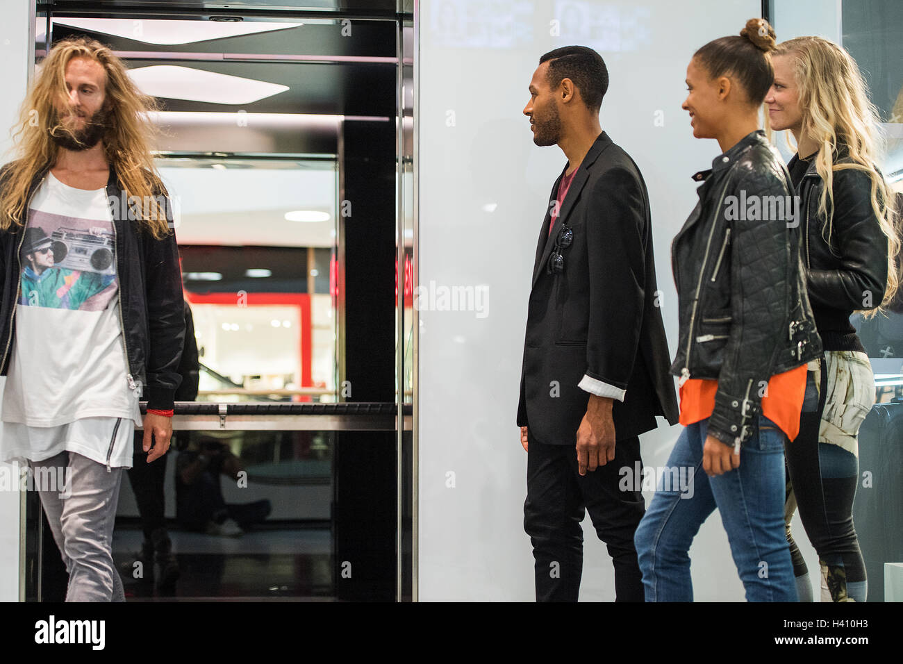 Getting out of an elevator Stock Photo - Alamy
