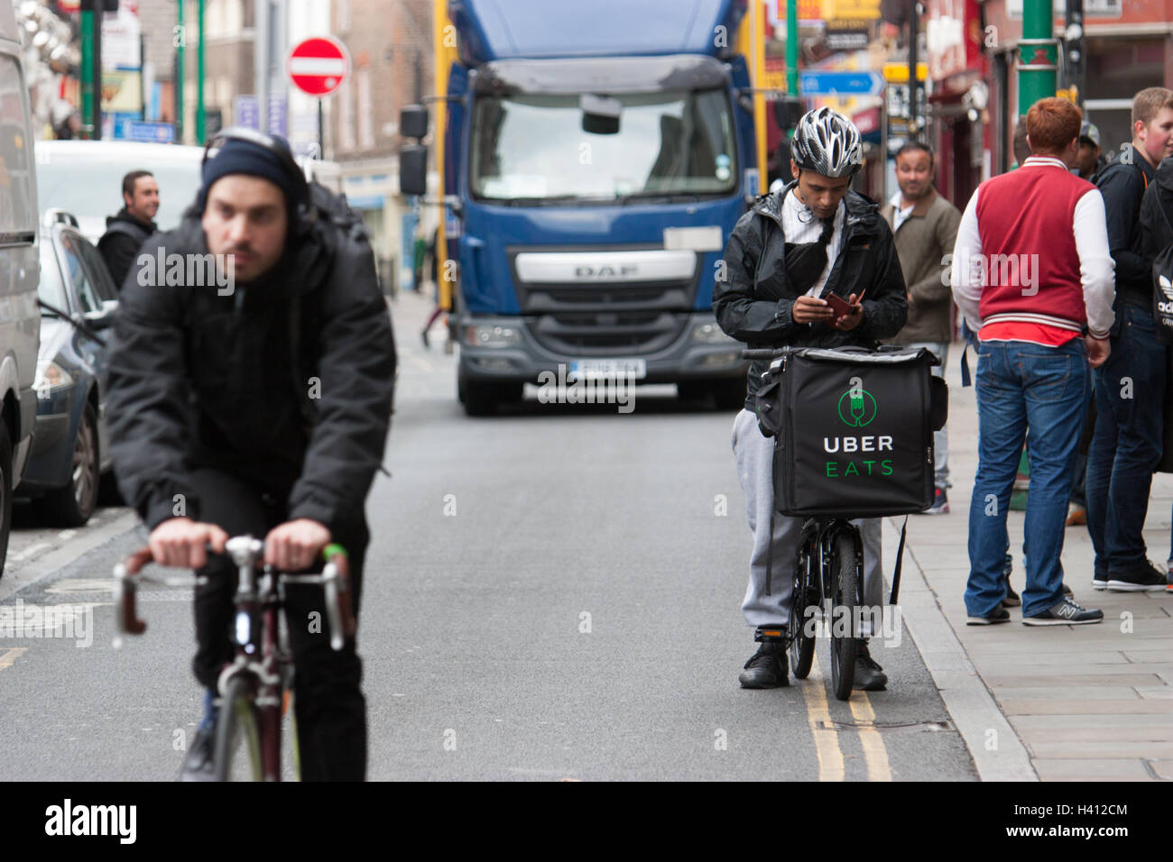 Ubereats uber eats, delivery cyclist, Brick Lane, London Stock Photo ...