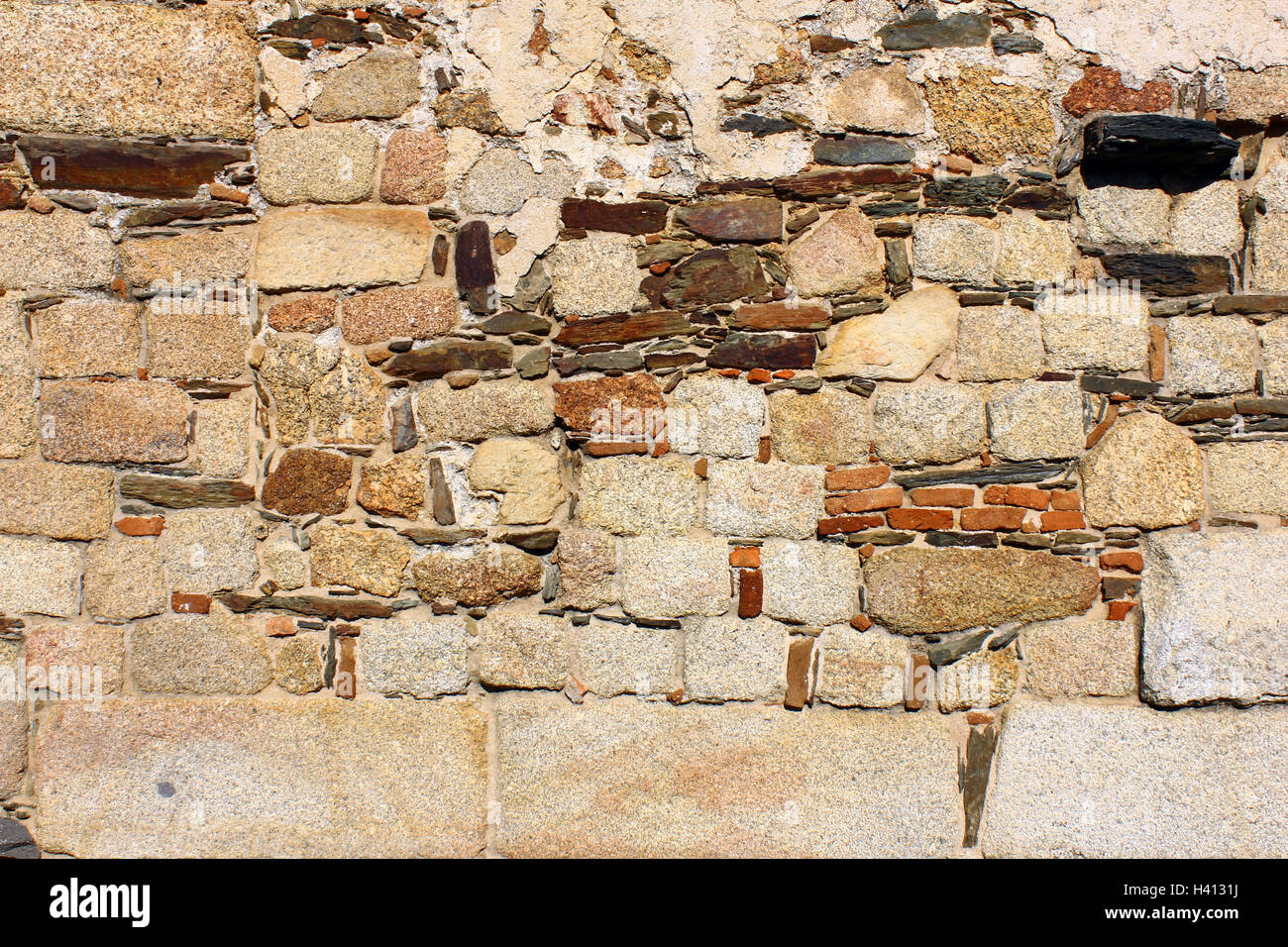 Detail of a stone wall Stock Photo - Alamy