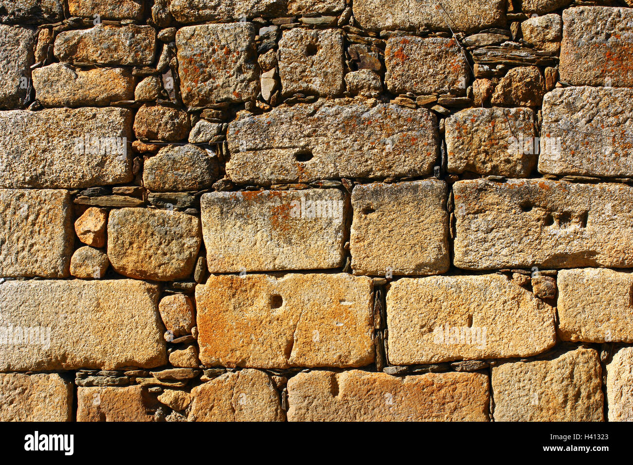 Detail of a stone wall Stock Photo - Alamy