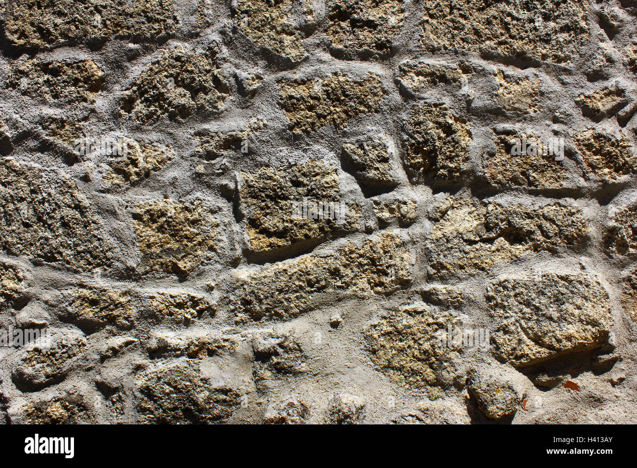 Detail of a stone wall Stock Photo - Alamy