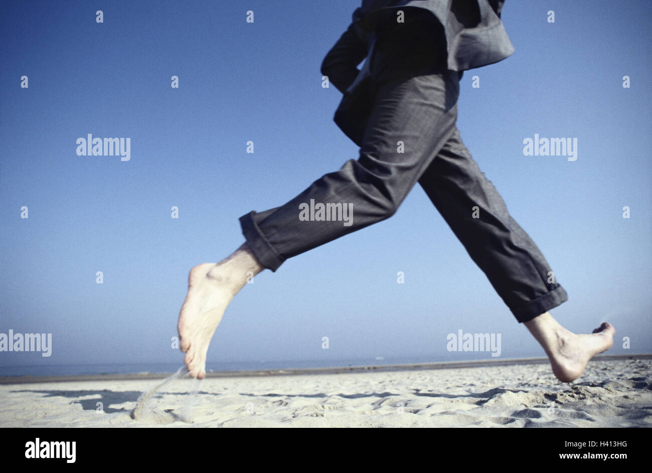 Sandy beach, businessman, barefoot, run, escape side view, detail, feet ...
