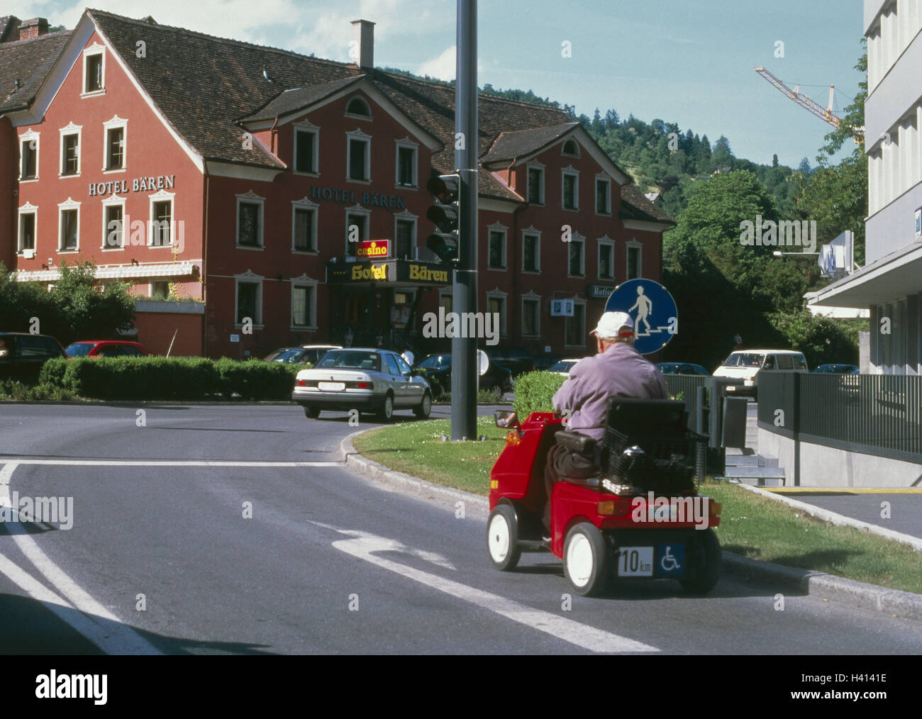Town traffic, man, Handicapped vehicle, red, traffic, disabled person ...