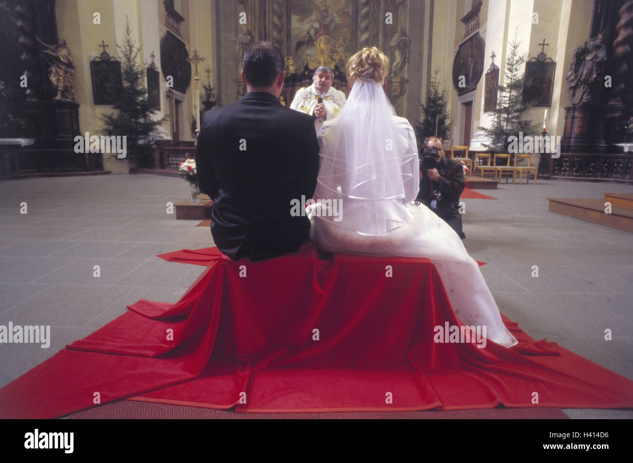 Church, bride and groom, back view, priest, ceremony, no model release ...